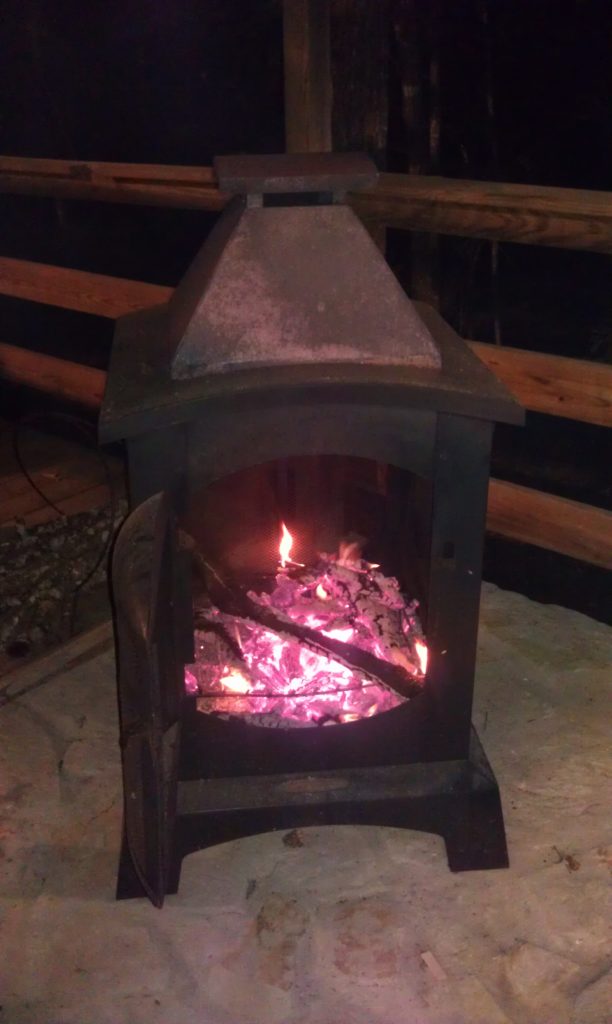 Wood burning stove at night | Clear View Retreat